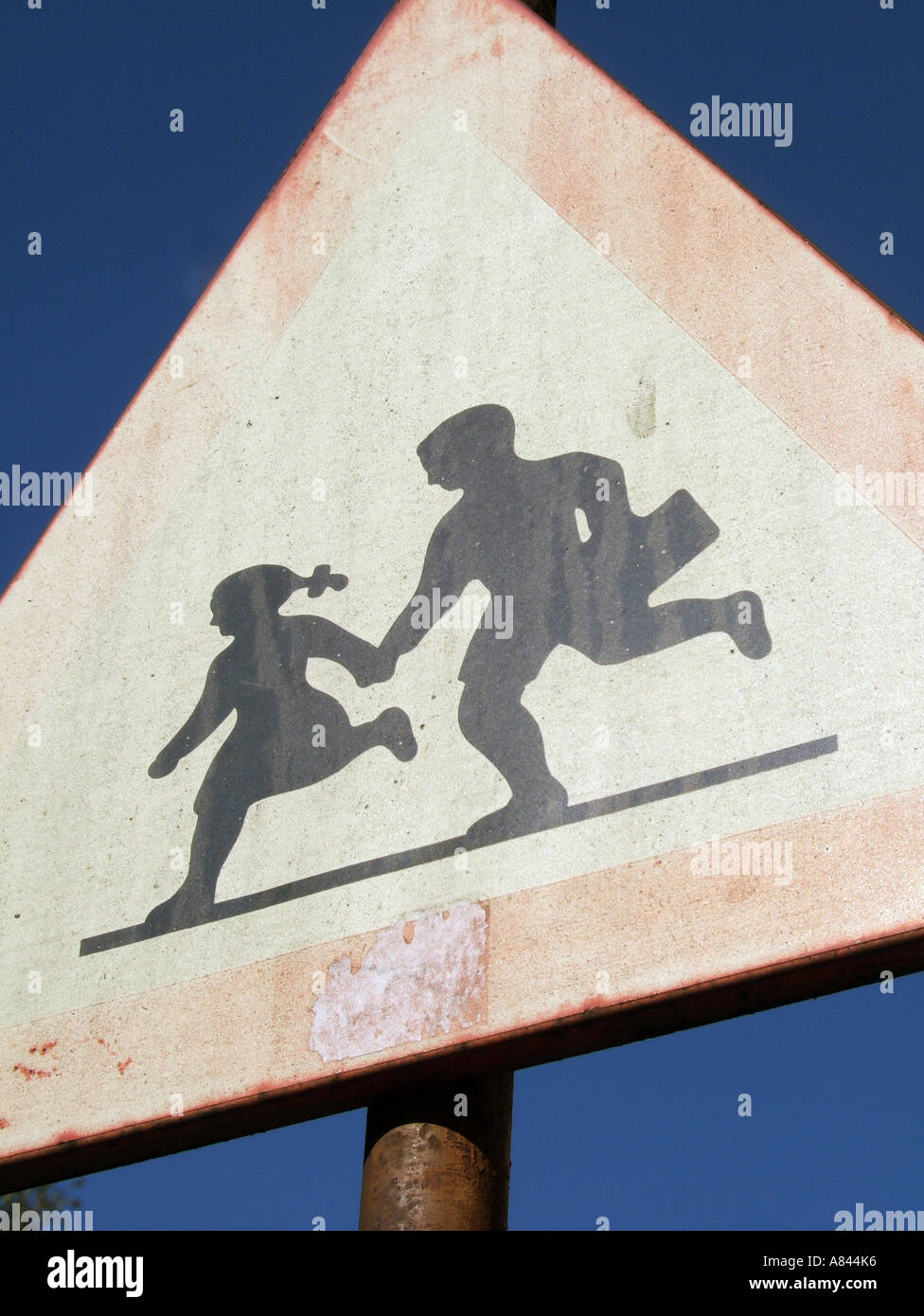 Children crossing road holding hands hi-res stock photography and ...