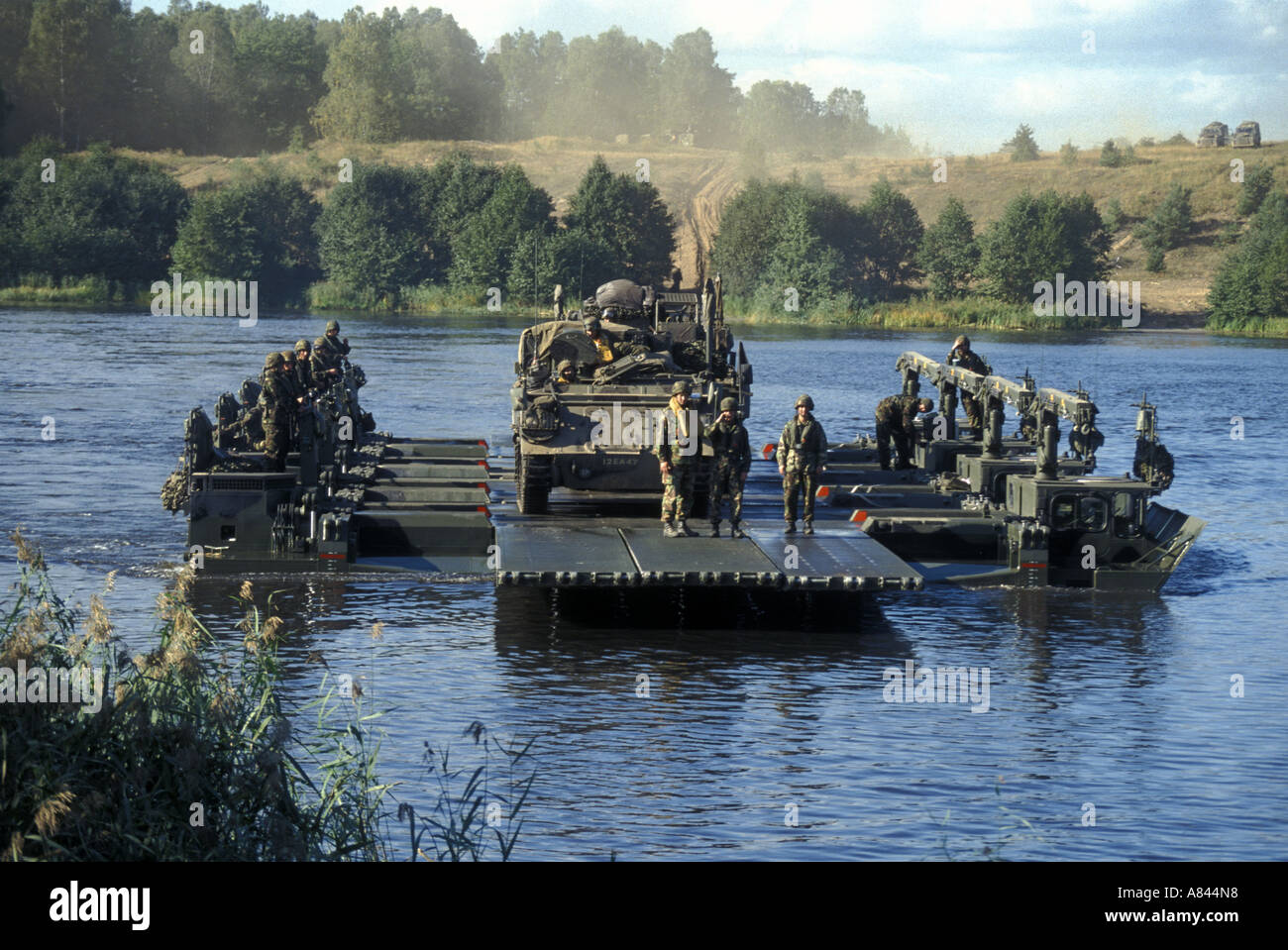 British Army M3 Amphibious Rig crossing water obstacle during exercise ...