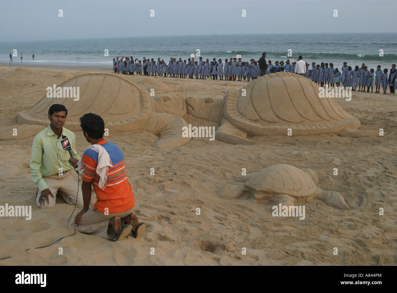 TV interview of sculptor of one of the Giant Sand sculptures highlight ...