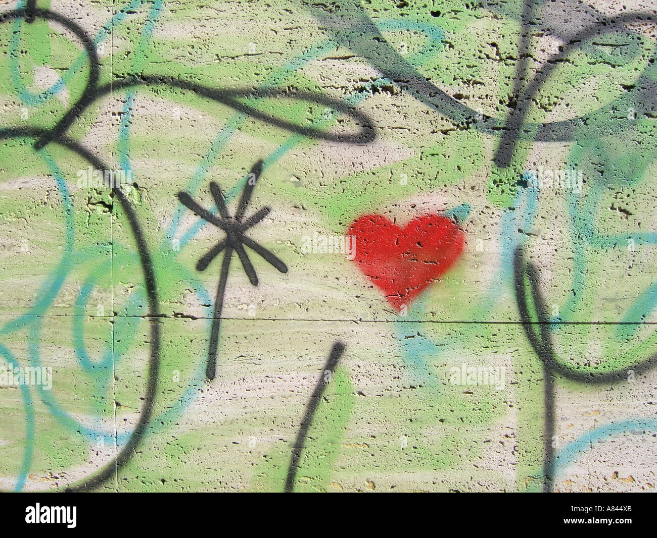 red heart painted on wall Stock Photo - Alamy