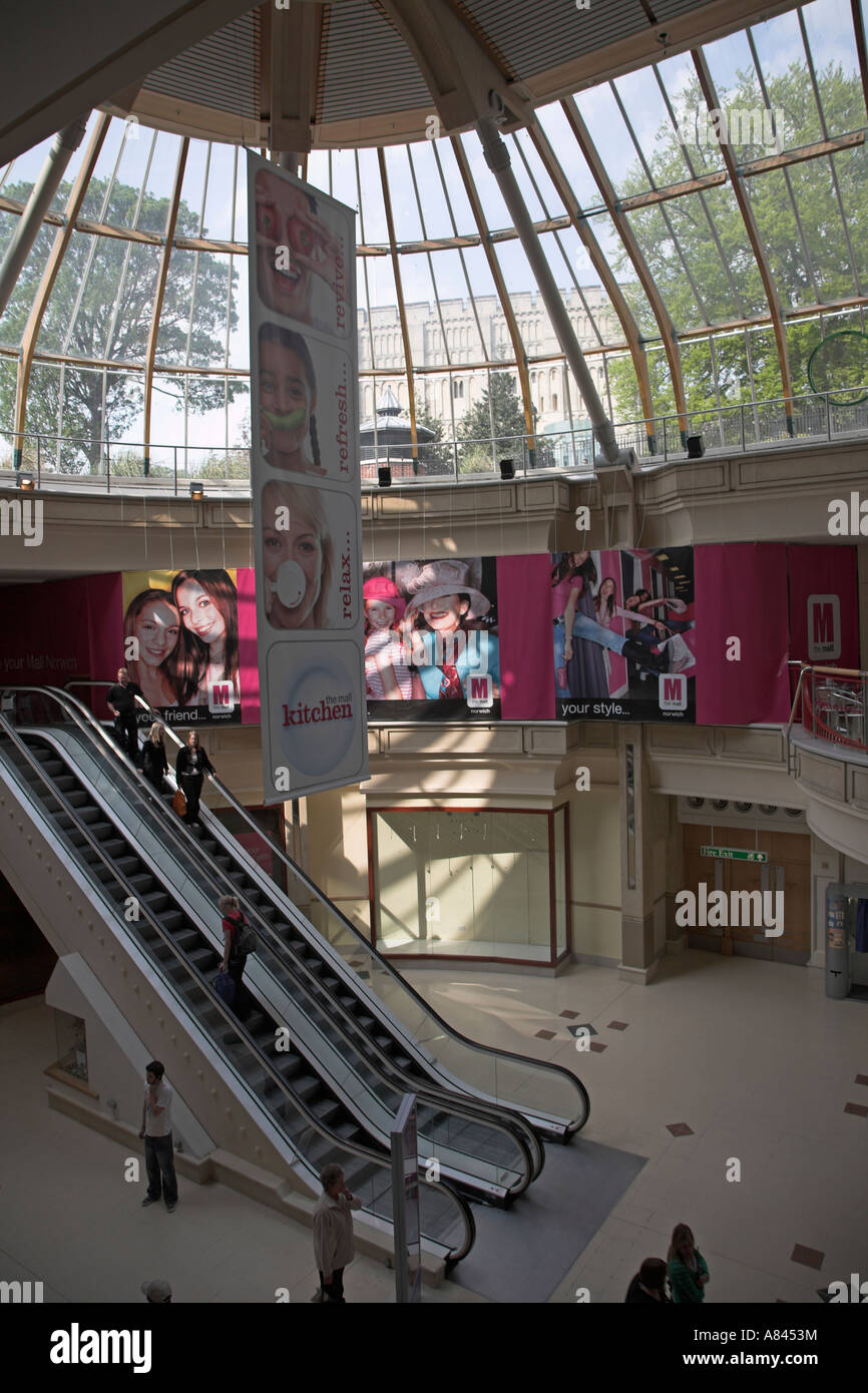 Interior showing escalators Castle Mall shopping centre Norwich Norfolk ...