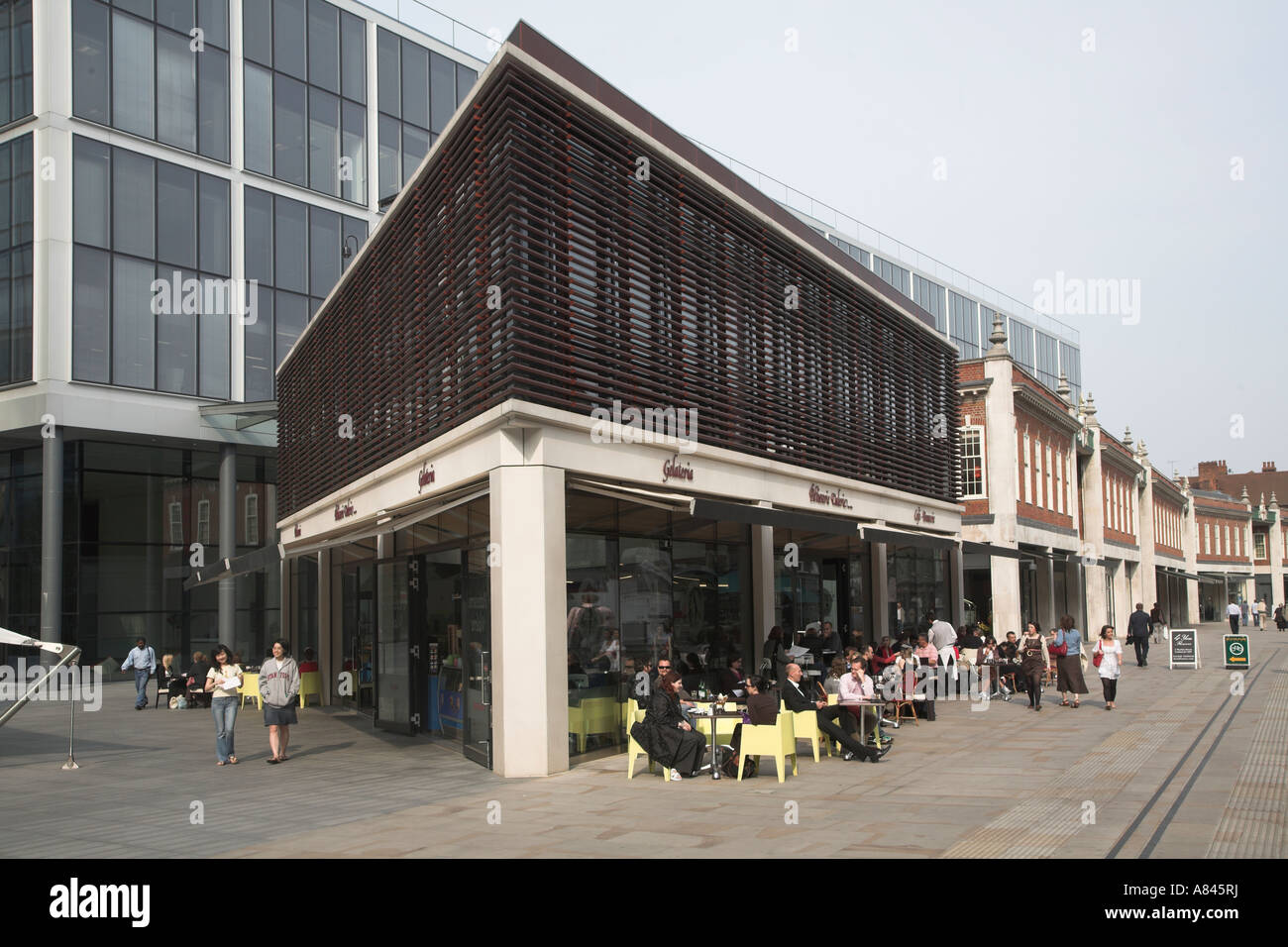 Tables outside cafe Bishop's Square, Spitalfields, London, E1, England ...