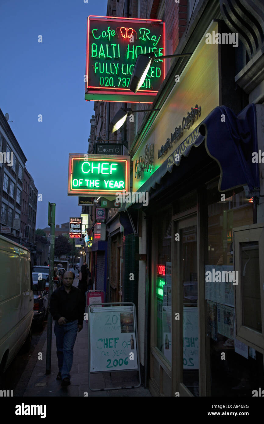 Balti House curry houses neon sign at night Brick Lane, London East End ...