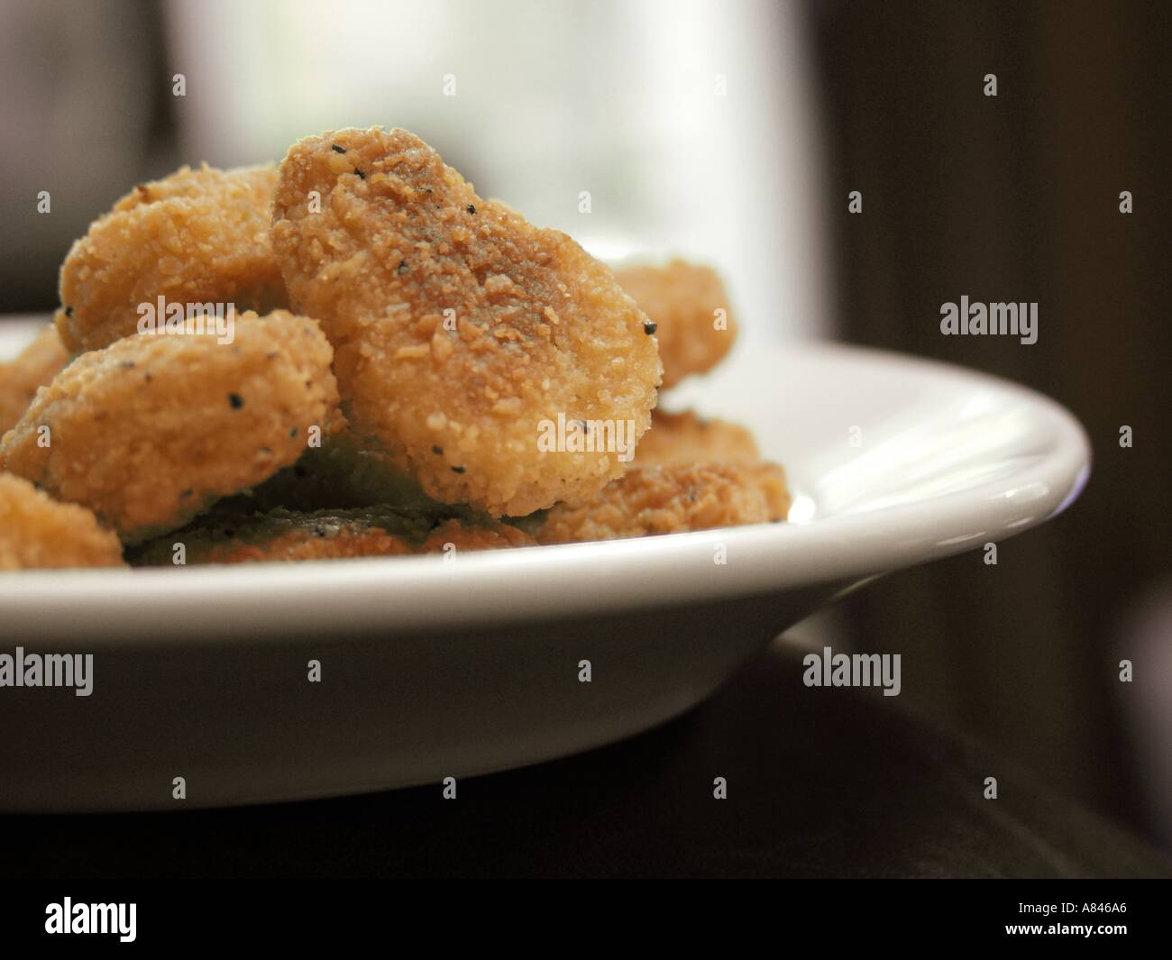 Chicken Nuggets on a Plate Stock Photo - Alamy