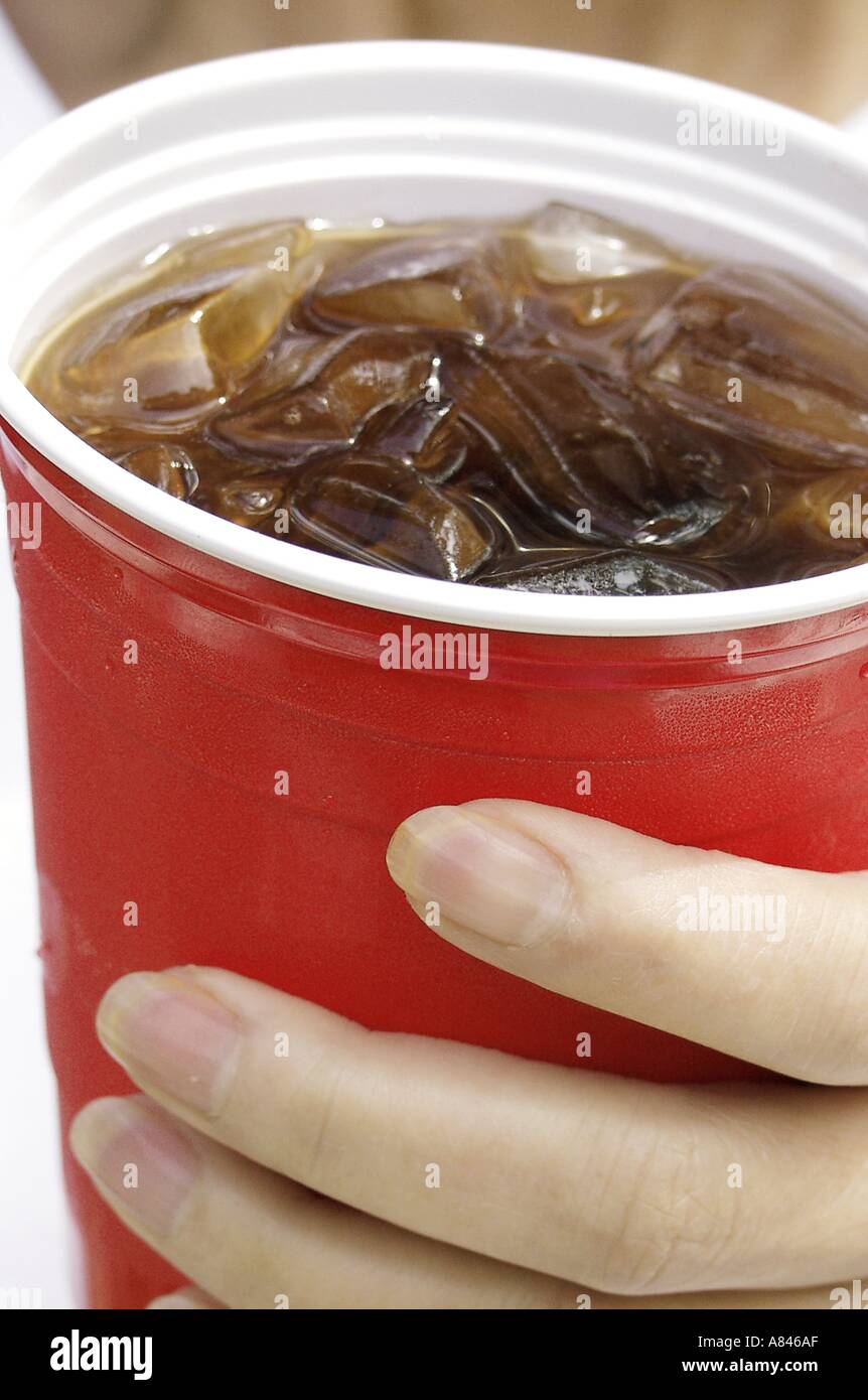 Holding a Cup of Cola Stock Photo - Alamy