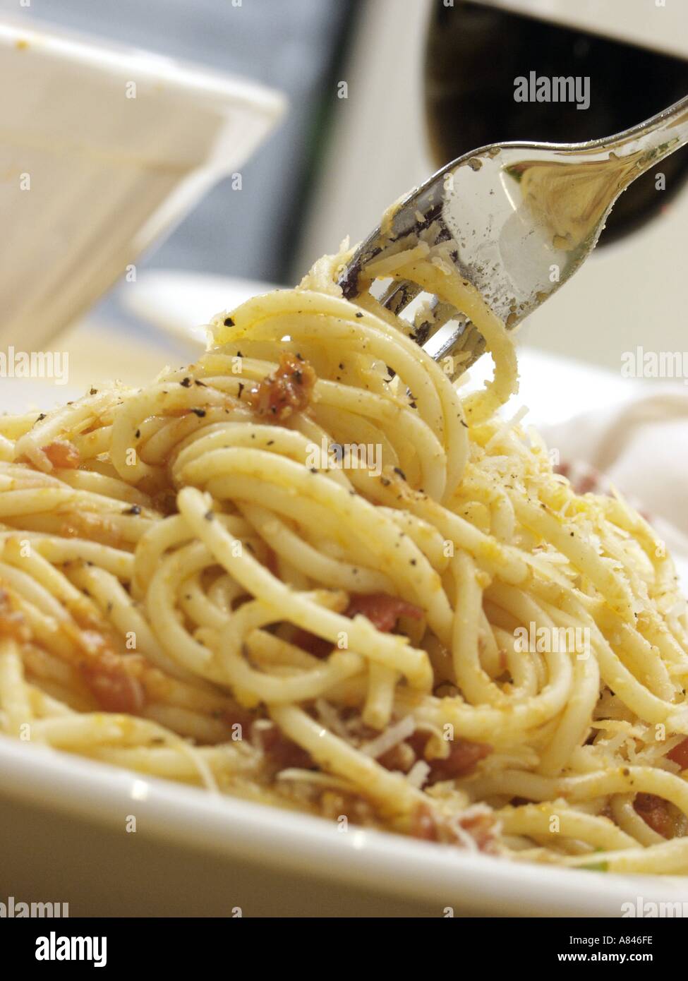 Spaghetti Twirled Around a Fork Stock Photo - Alamy