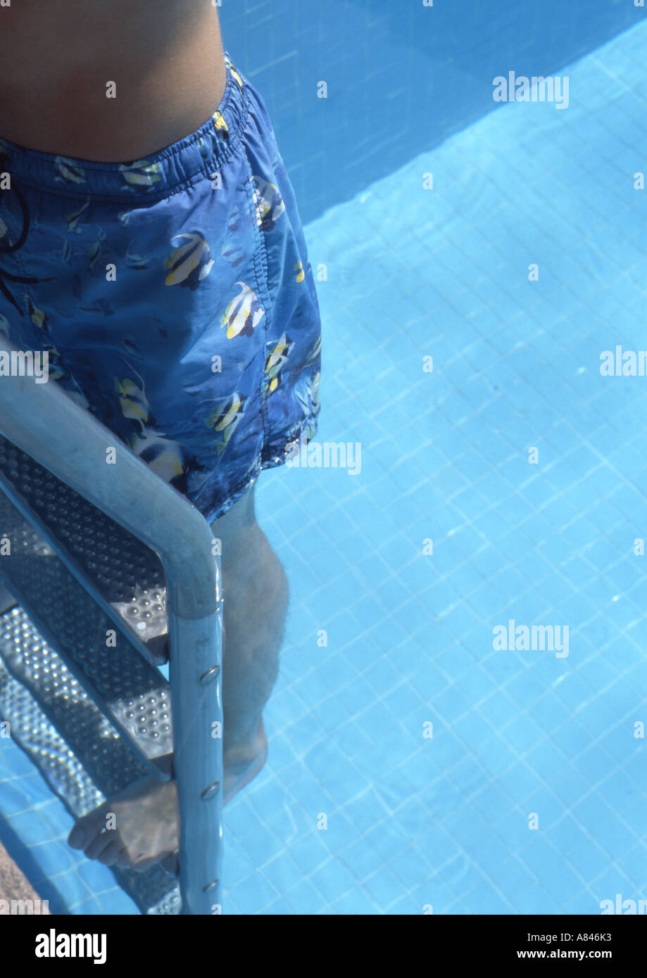 man with fish covered bathing costume and swimming pool Stock Photo - Alamy