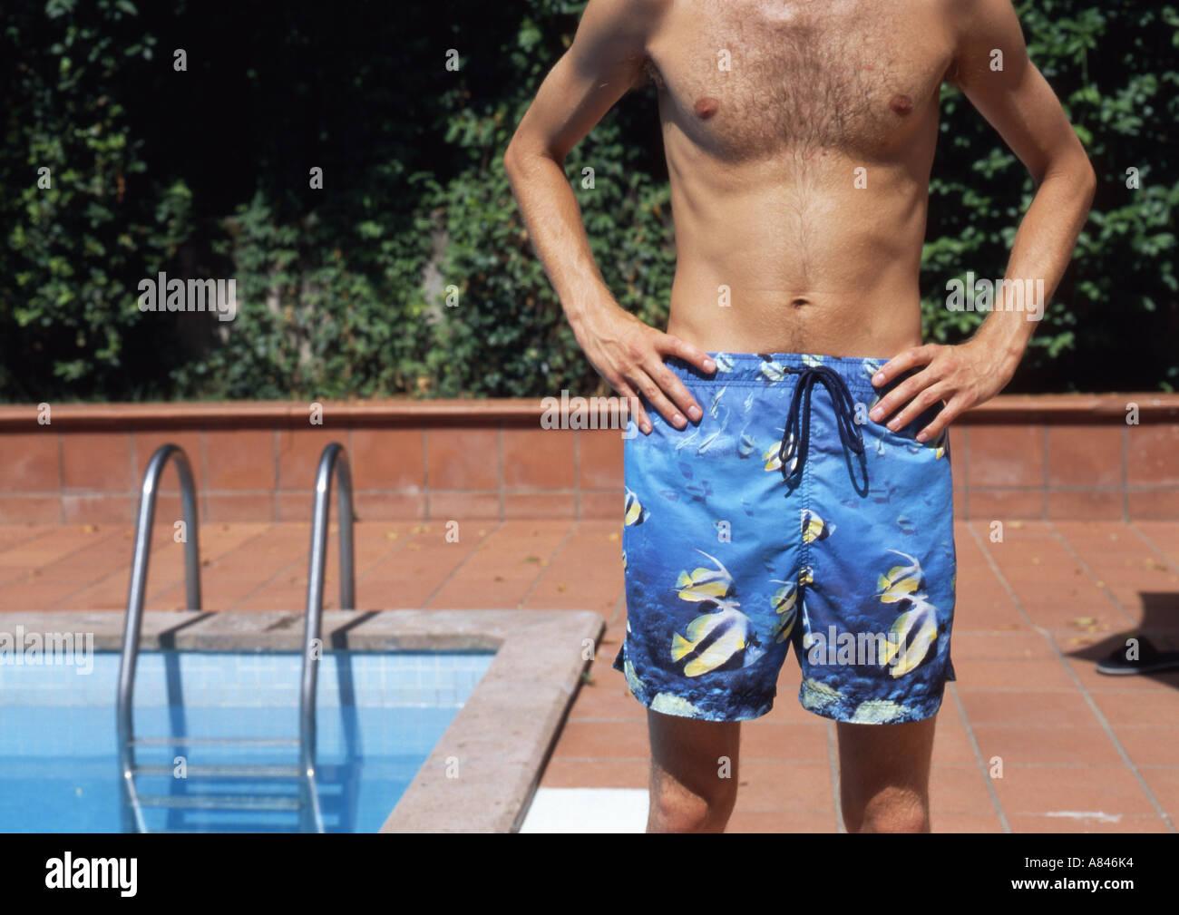 man with fish covered bathing costume and swimming pool Stock Photo - Alamy