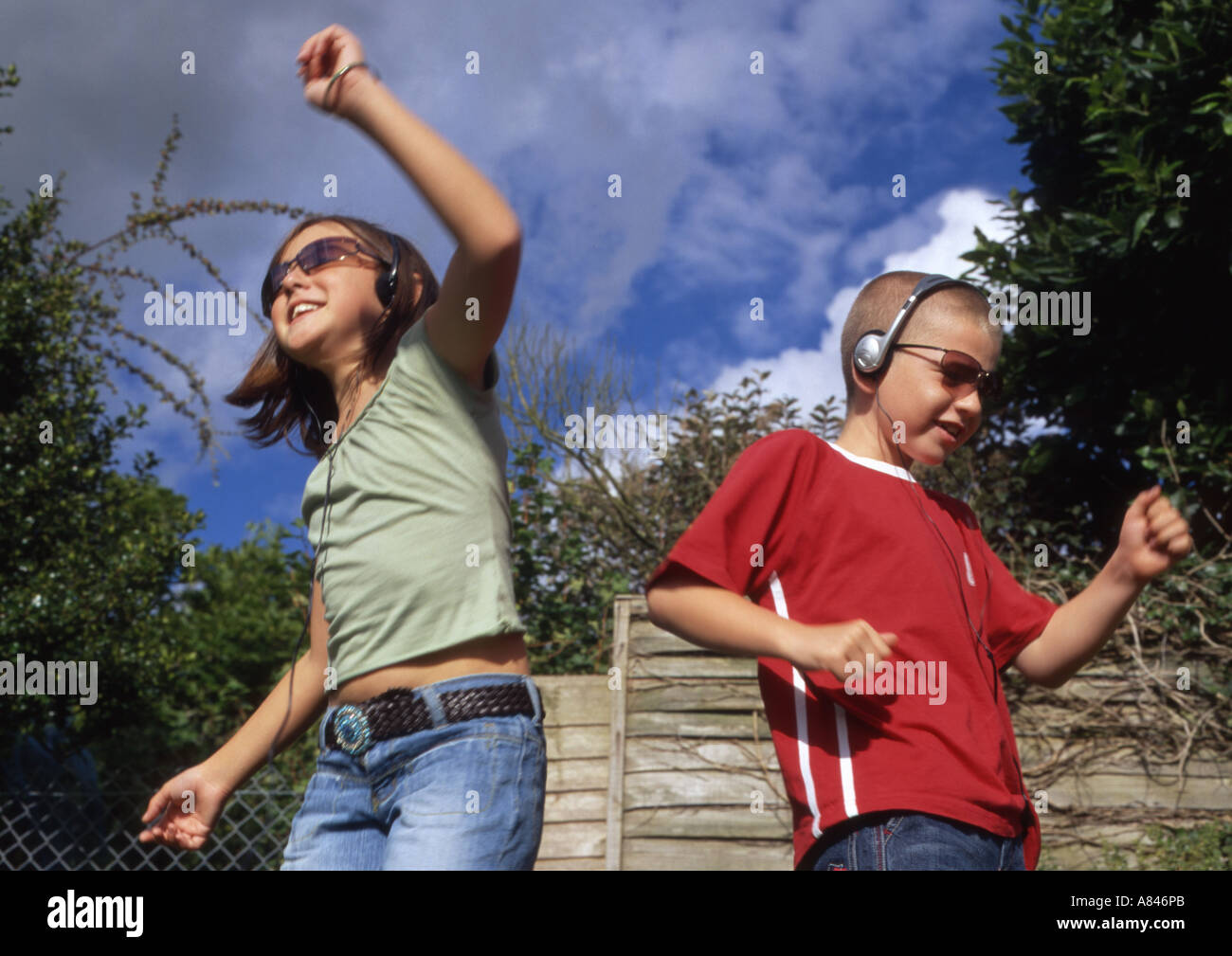 two kids dancing outdoors Stock Photo - Alamy