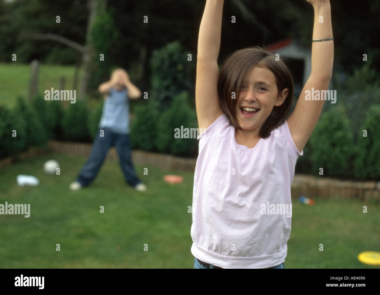 girl scoring winning goal Stock Photo - Alamy