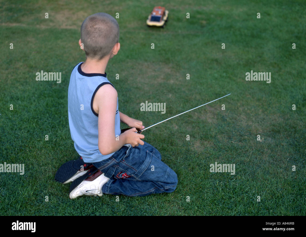 boy playing with remote control car Stock Photo - Alamy
