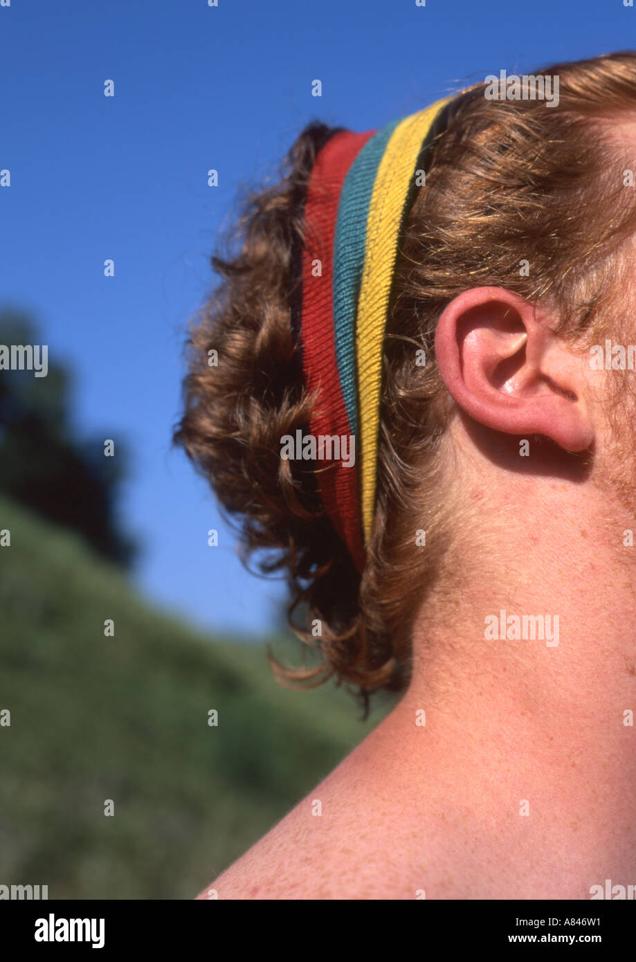 man wearing hair band Stock Photo - Alamy