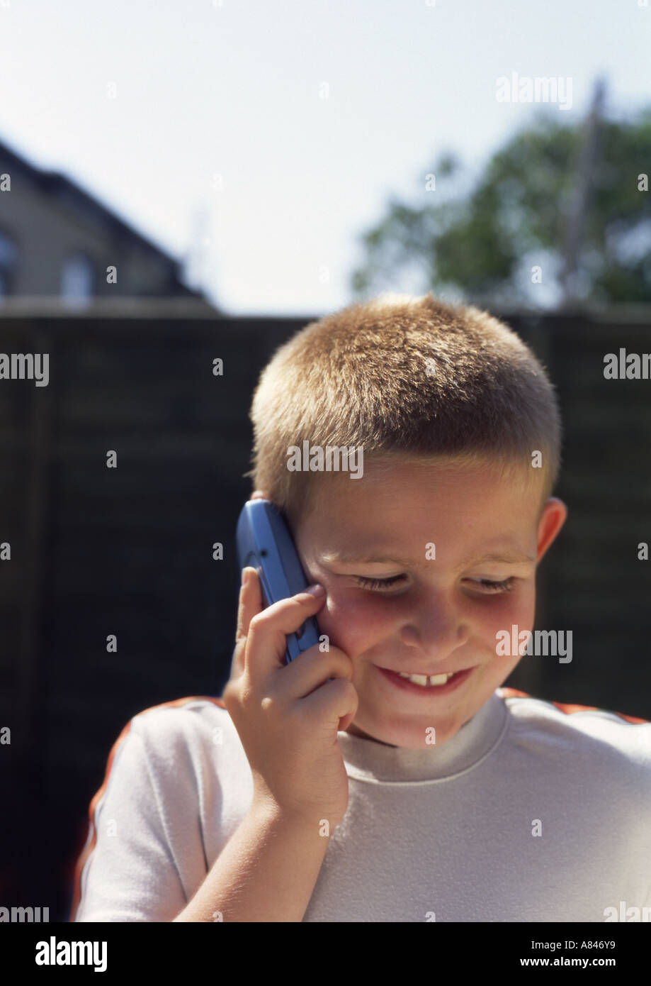 boy talking on phone Stock Photo - Alamy