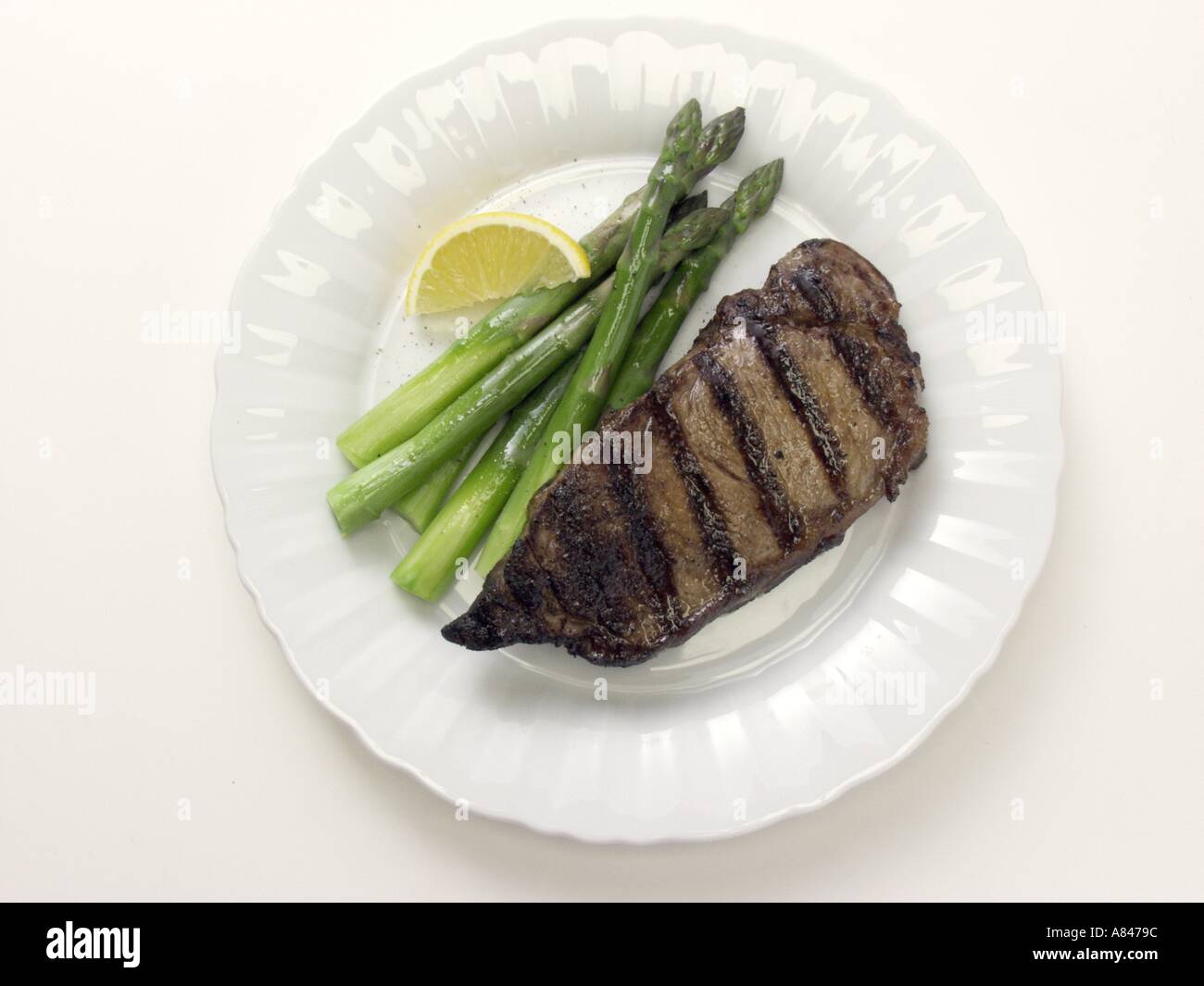 Rib Eye Steak with Asparagus Stock Photo - Alamy