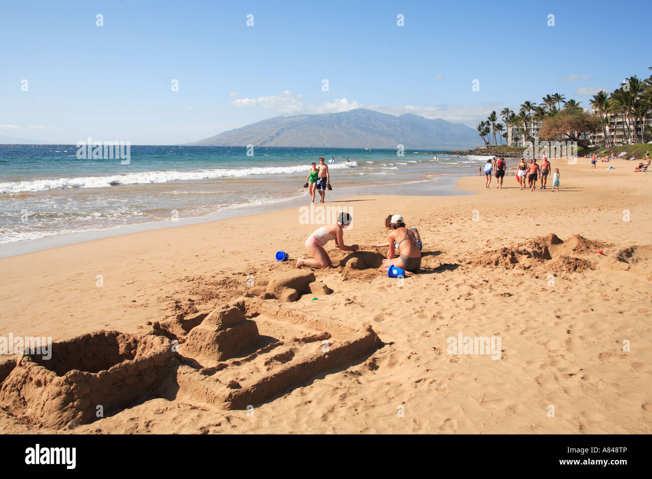 kids building sand castle at kamaole beach park II at south kihei rd ...