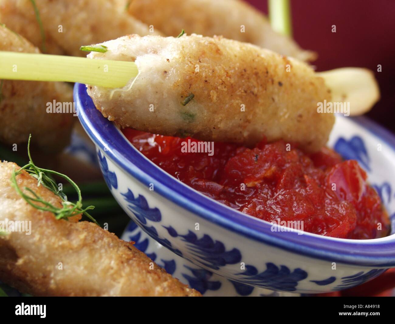 Crispy Thai fish rolls with chili sauce 4 Stock Photo - Alamy
