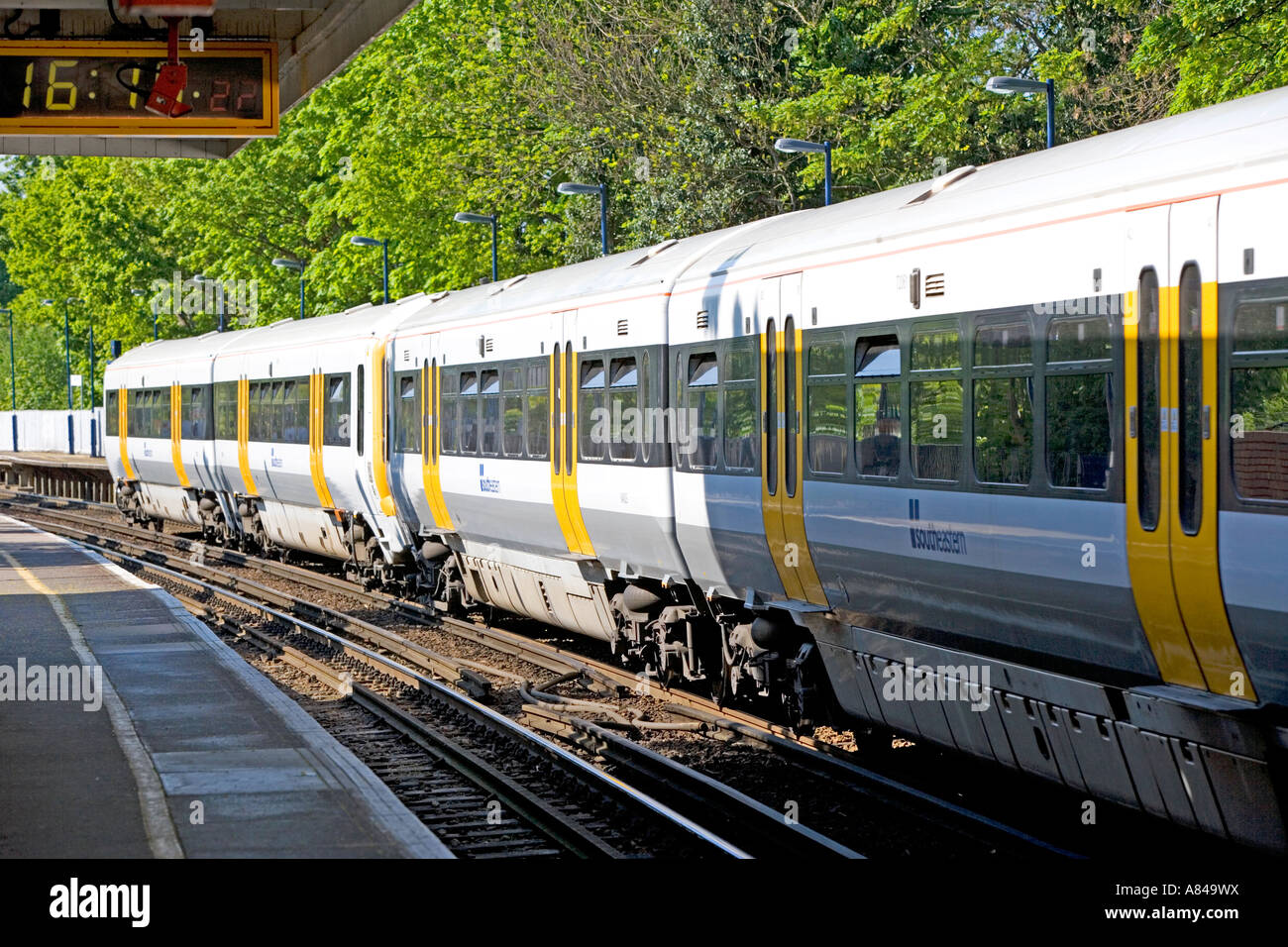 Train stopped in station in South London, England, UK Stock Photo - Alamy