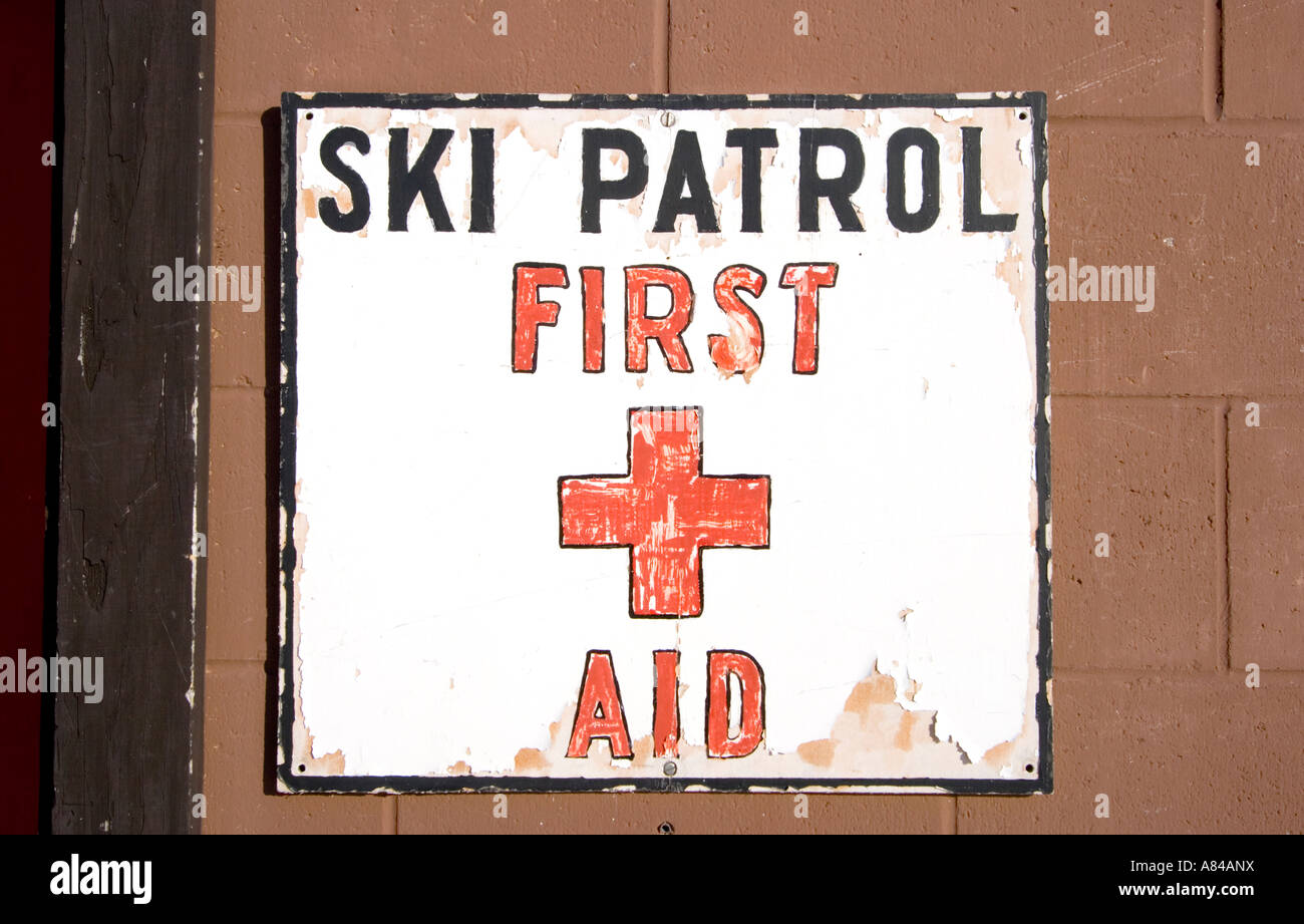 Well worn ski patrol first aid sign outside the rescue station ...