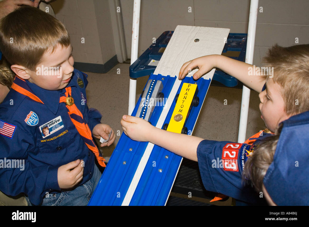 Cub Scouts age 7 starting race cars for Pinewood Derby. Horace Mann ...