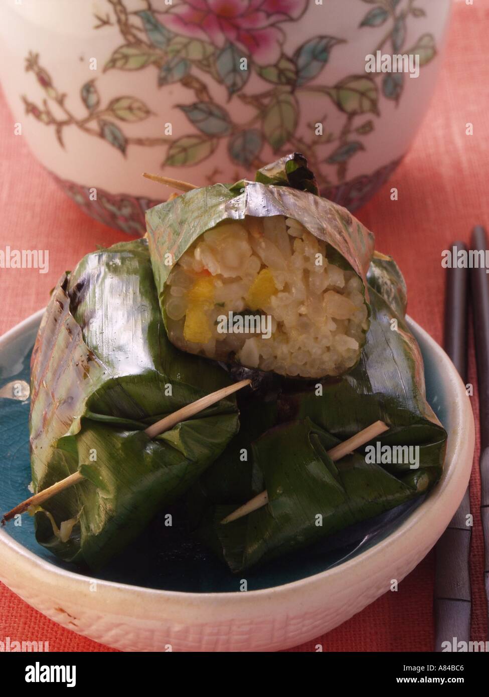 Asian rice parcels in banana leaf 1 Stock Photo - Alamy