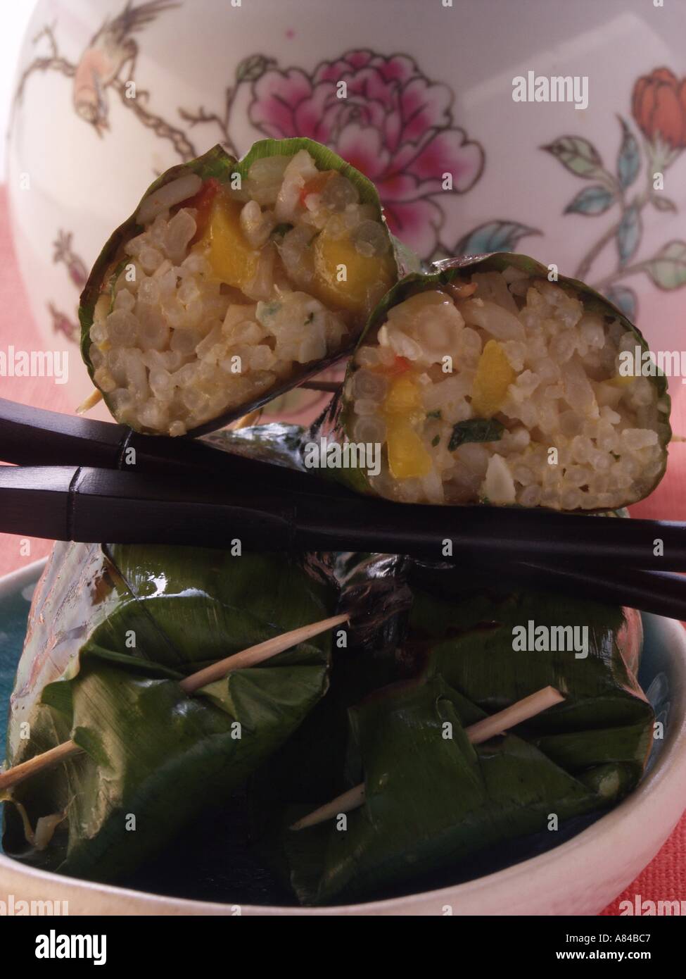 Asian rice parcels in banana leaf 2 Stock Photo - Alamy