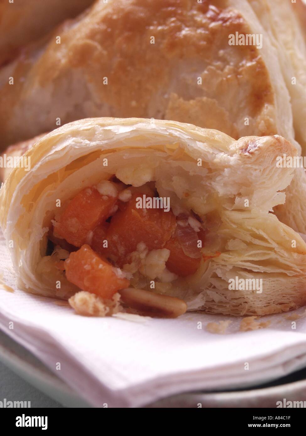Puff pastry parcel with pumpkin filling piece cut out 1 Stock Photo - Alamy