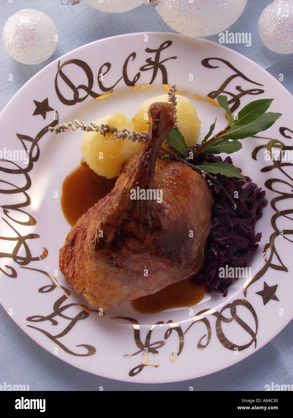 Duck with red cabbage potato dumplings for Christmas 5 Stock Photo - Alamy