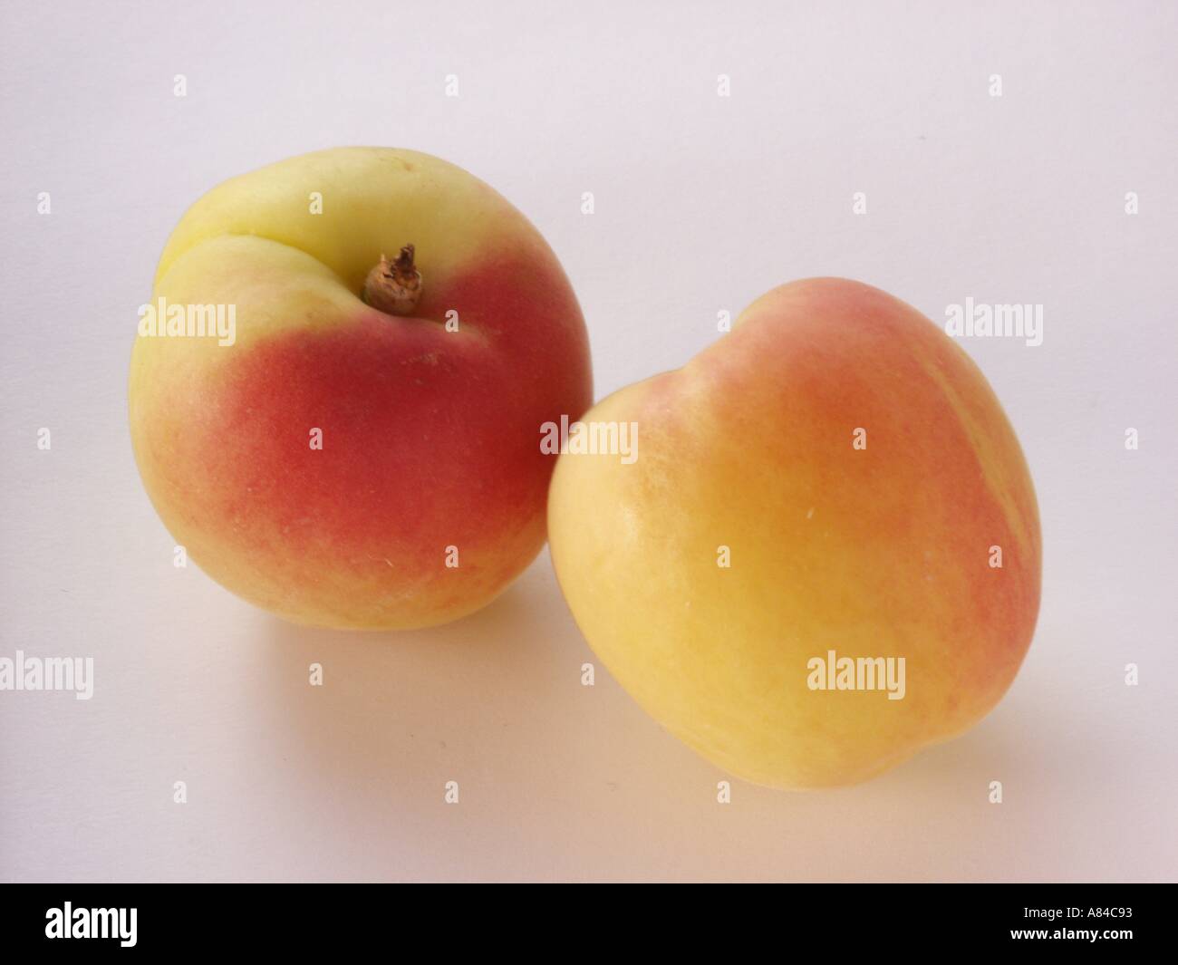 Two peaches hi-res stock photography and images - Alamy