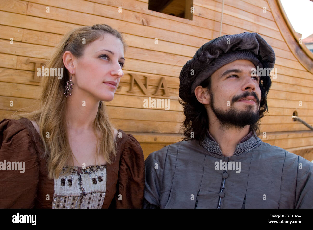 Two young people wearing renaissance costumes at the opening ceremony ...