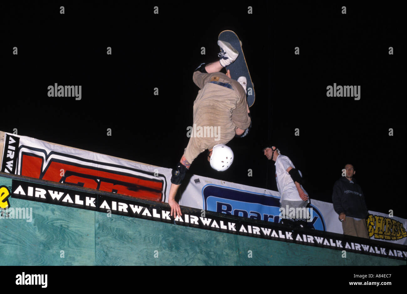 Youth on half pipe ramp at a skateboarding event in London Stock Photo ...