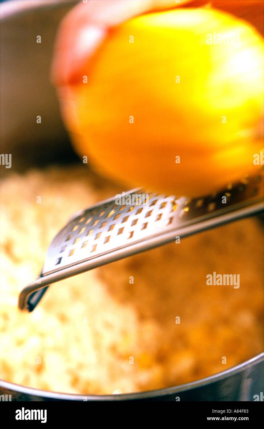 Grating lemon rind Stock Photo - Alamy