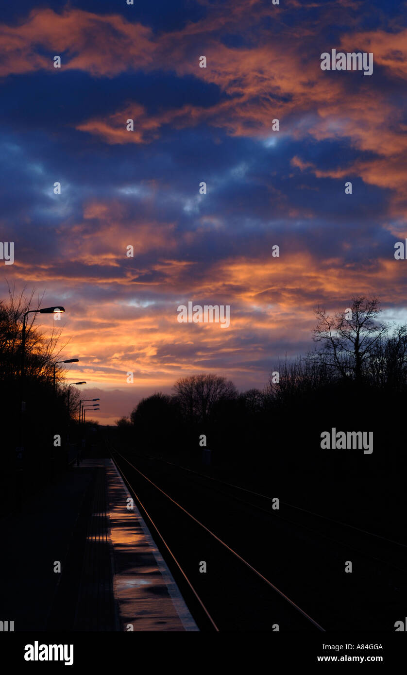Sunset over a railway line Stock Photo - Alamy
