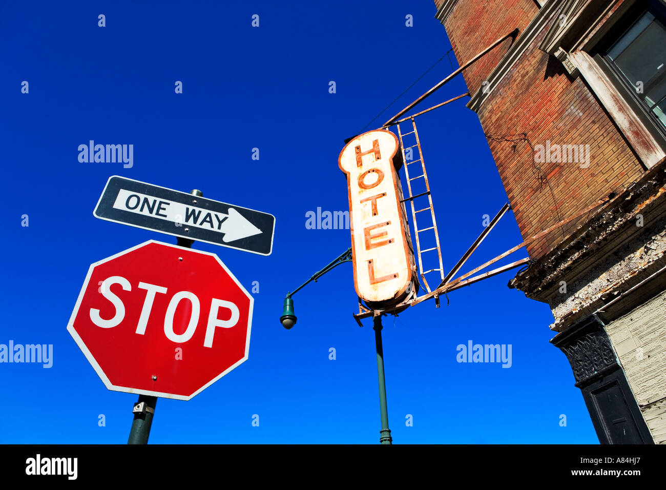 HOTEL AND STOP SIGN, ONE WAY ARROW Stock Photo - Alamy