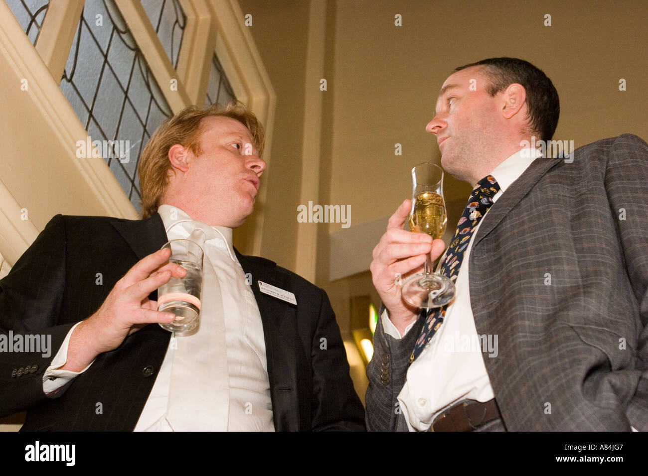 Networking business men at club Stock Photo - Alamy