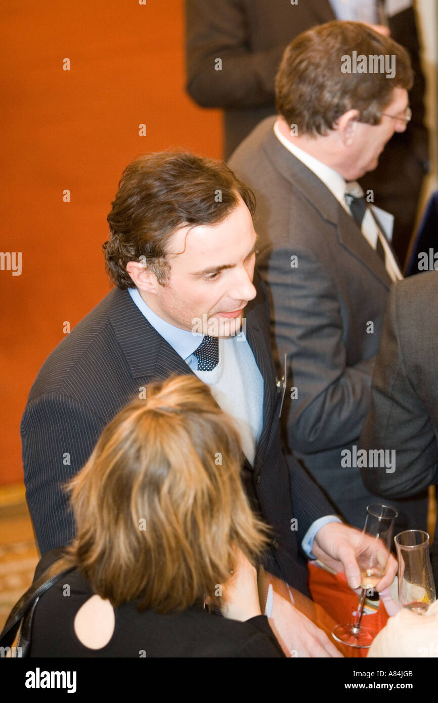 Networking business man at club Stock Photo - Alamy