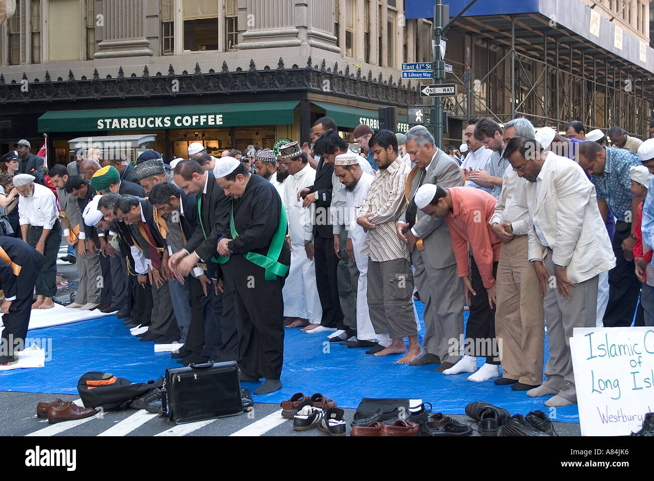 Muslim American men during prayer before the beginning of the annual ...