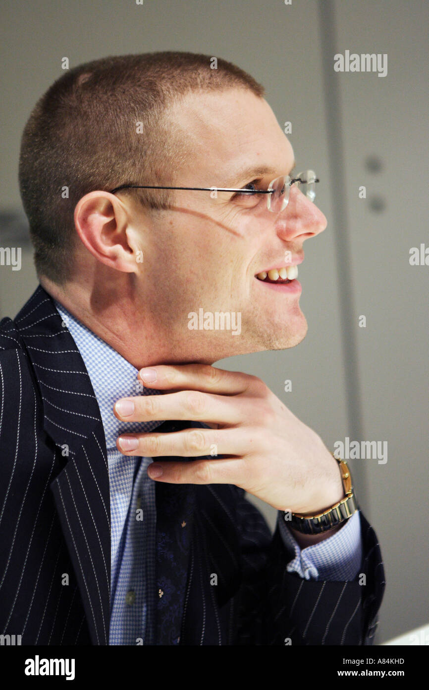 Businessman posing for a commercial photoshoot in office boardroom ...