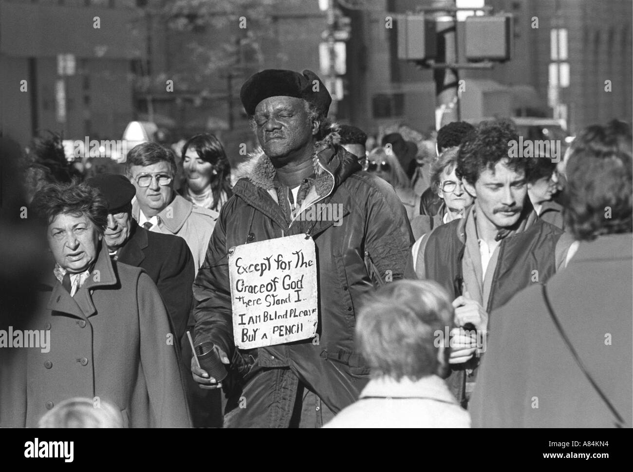 Blind man on 5th Avenue in Manhattan selling pencils Stock Photo - Alamy