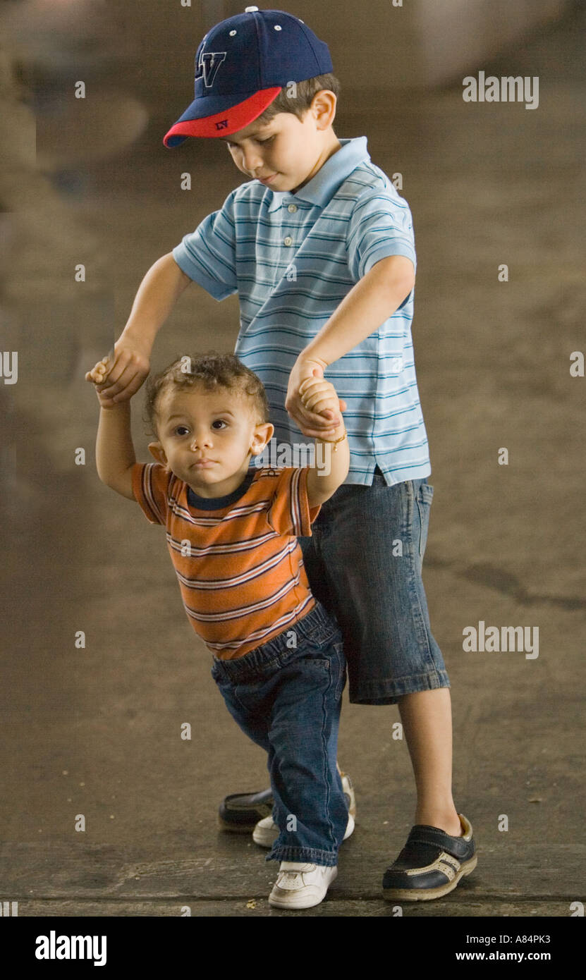 Boy and his little brother Stock Photo - Alamy