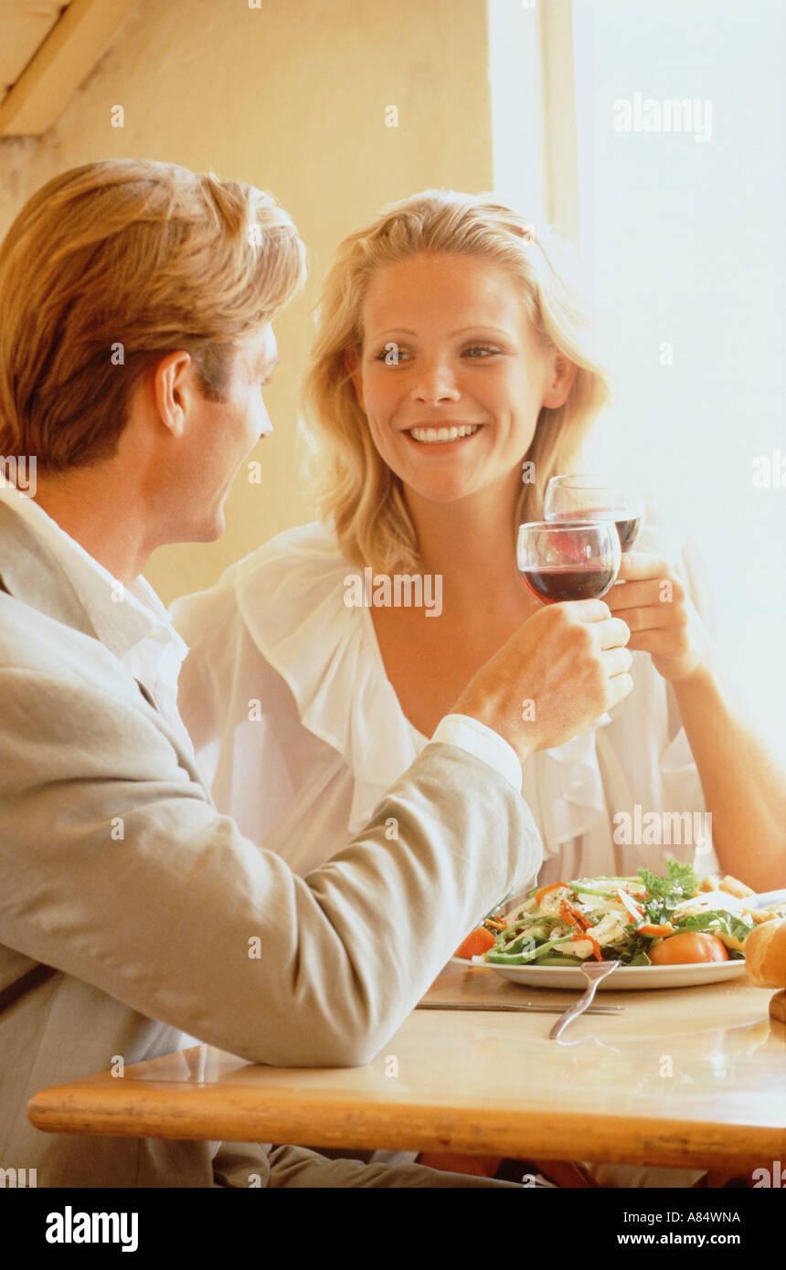Indoor close-up of young couple dining in restaurant Stock Photo - Alamy