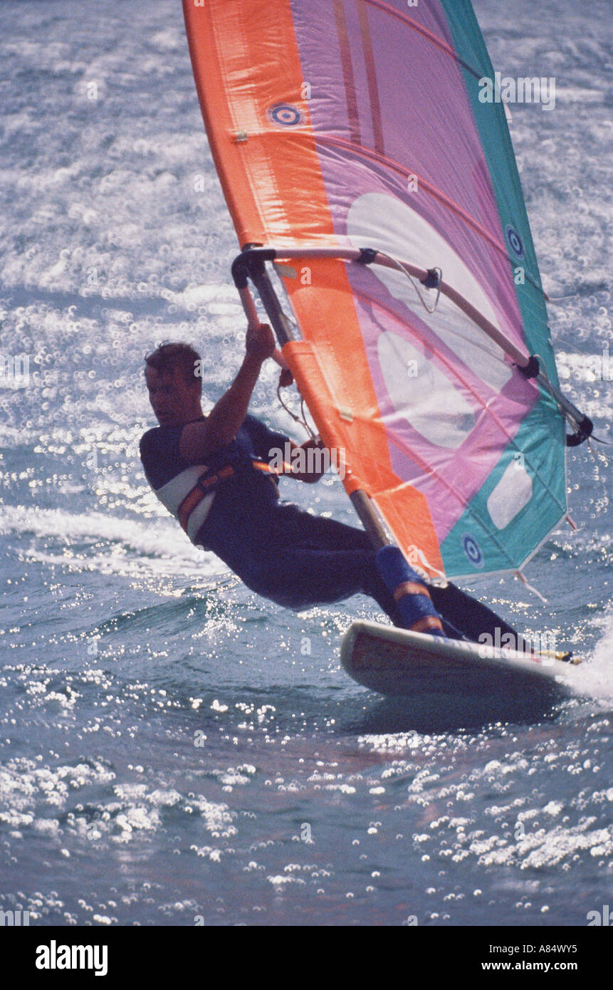 Man windsurfing at sea Stock Photo - Alamy