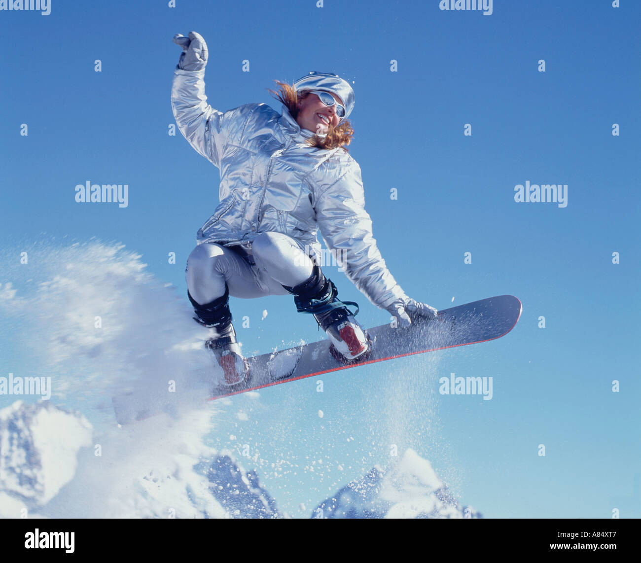 Woman and snowboard hi-res stock photography and images - Alamy