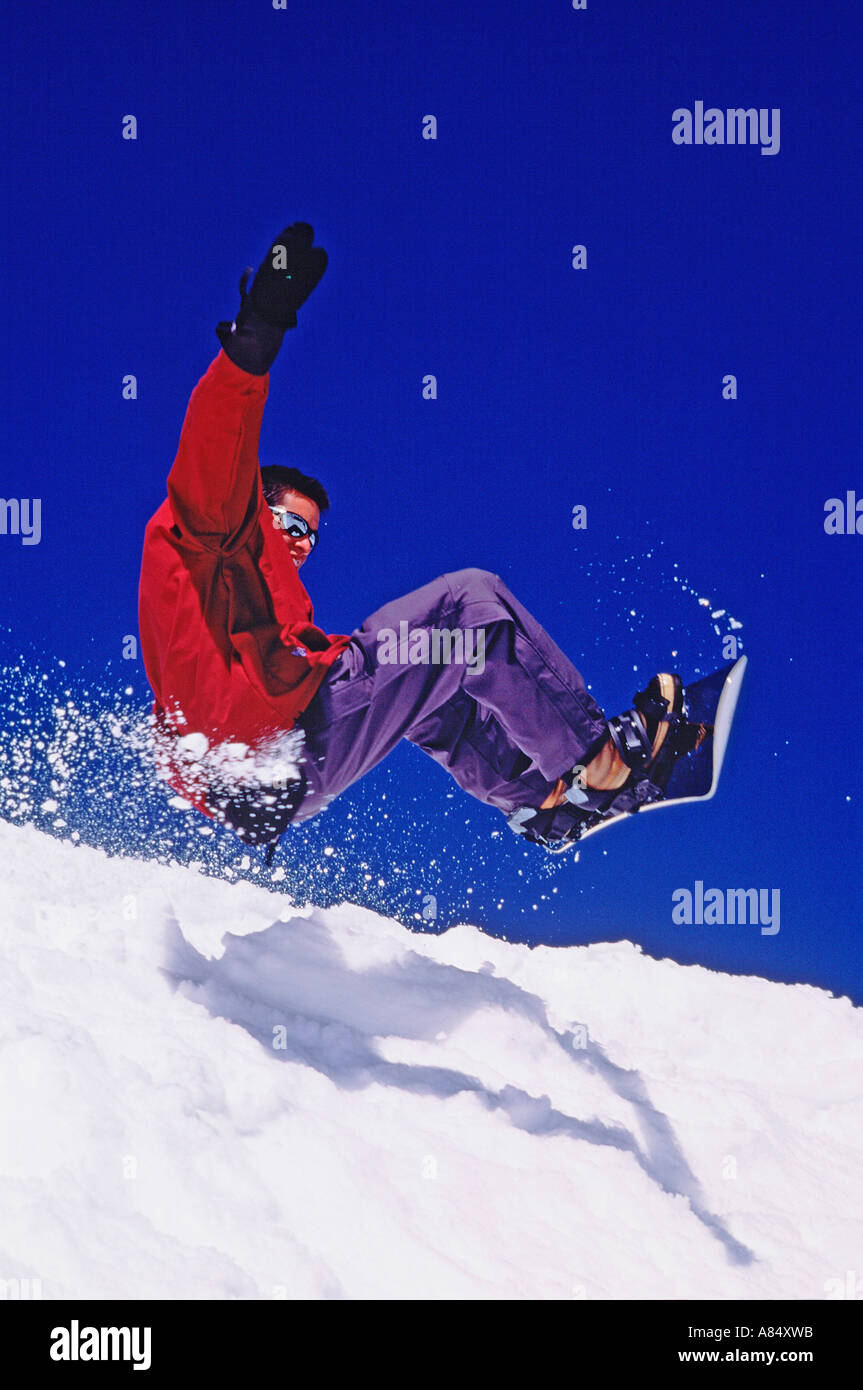 Snow boarding man Stock Photo - Alamy