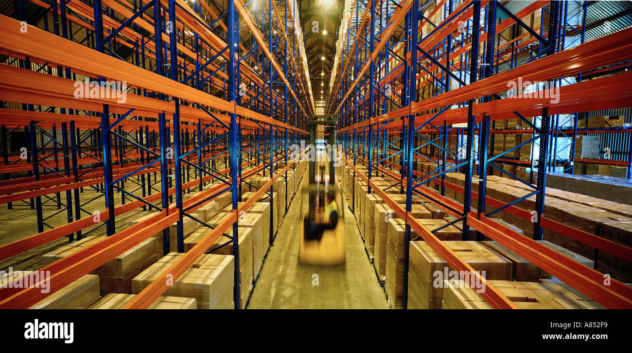 INTERIOR OF WAREHOUSE WITH FORKLIFT TRUCK UK Stock Photo - Alamy