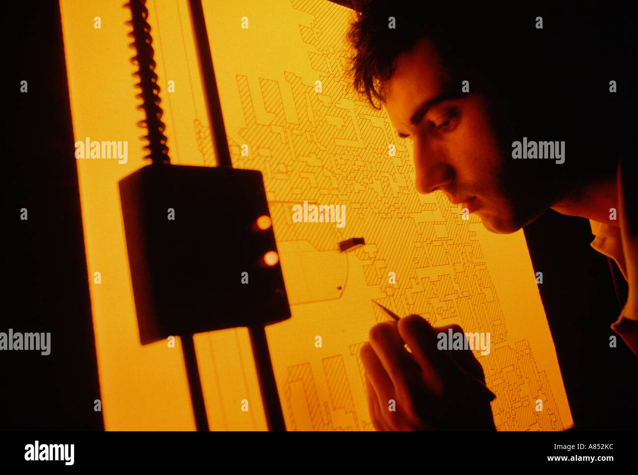 Close up of young man working on lightbox technical transparency Stock ...
