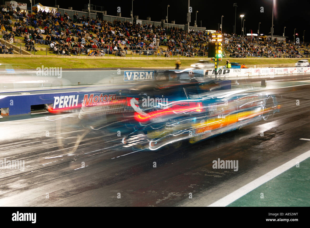 drag racing time exposure showing 'Ghost image' of car leaving start ...