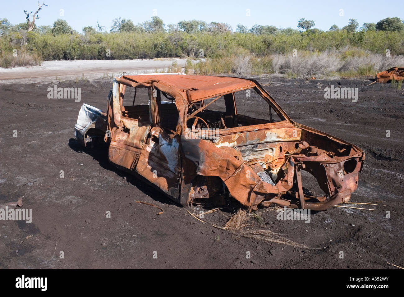 burnt out abondoned car wreck in the Australian bush Stock Photo - Alamy