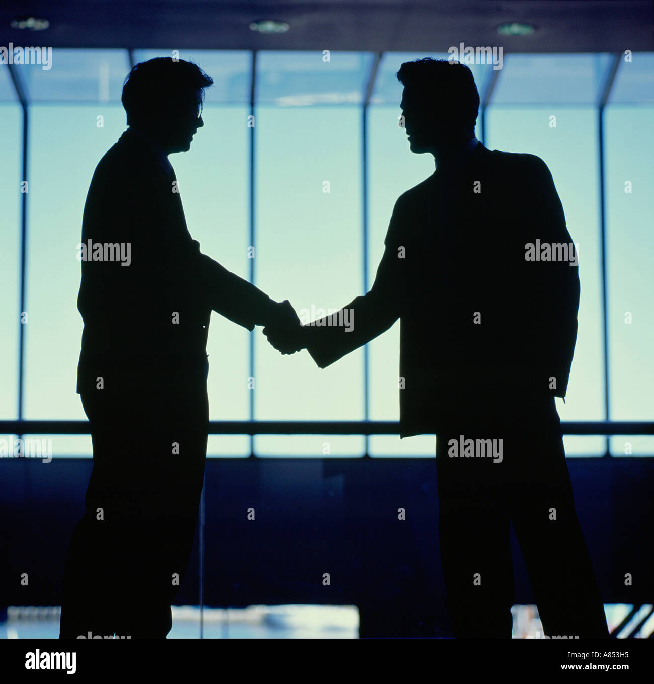 Side profile of two men standing hi-res stock photography and images ...