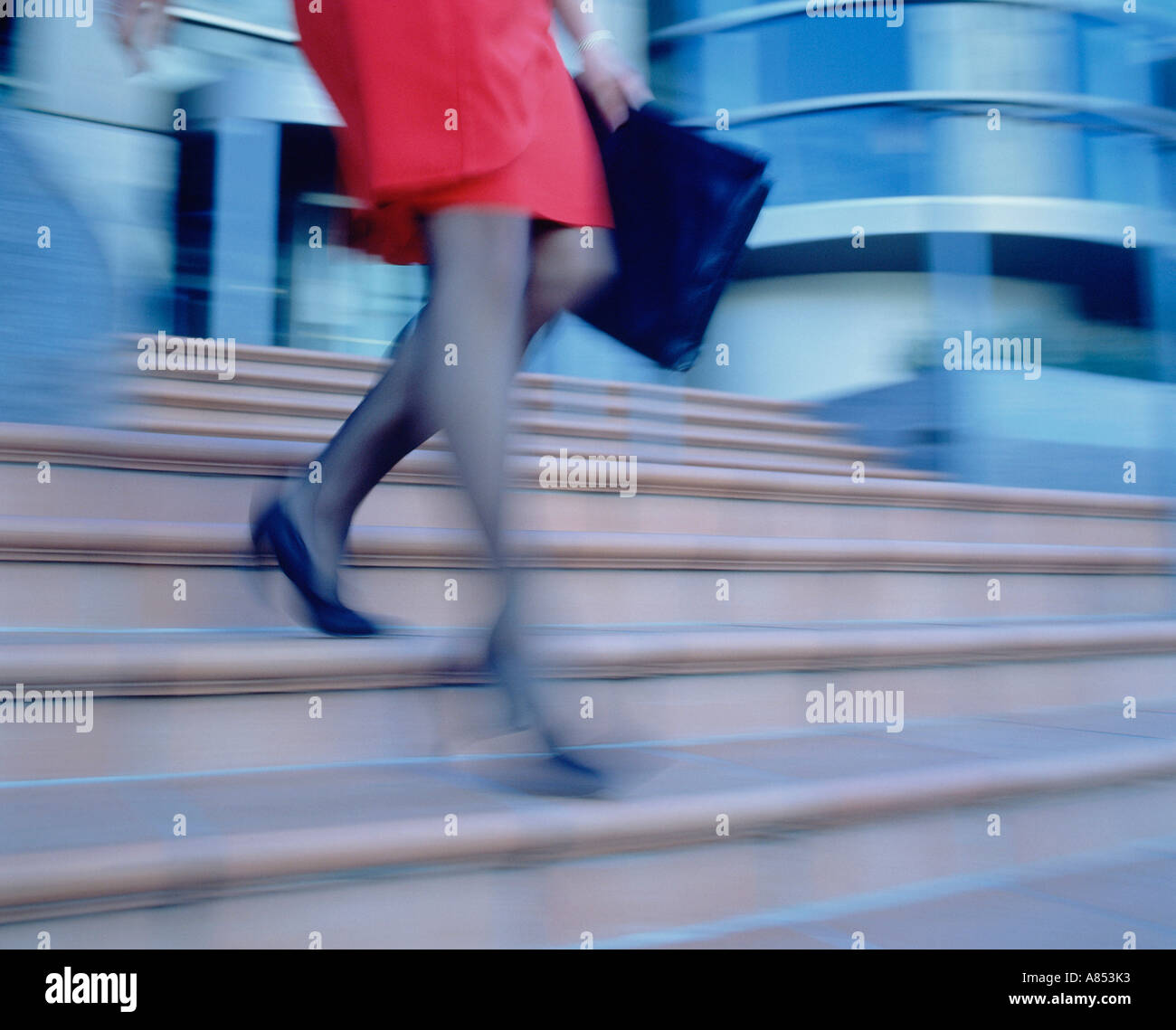 Close-up of woman's legs running down steps Stock Photo - Alamy