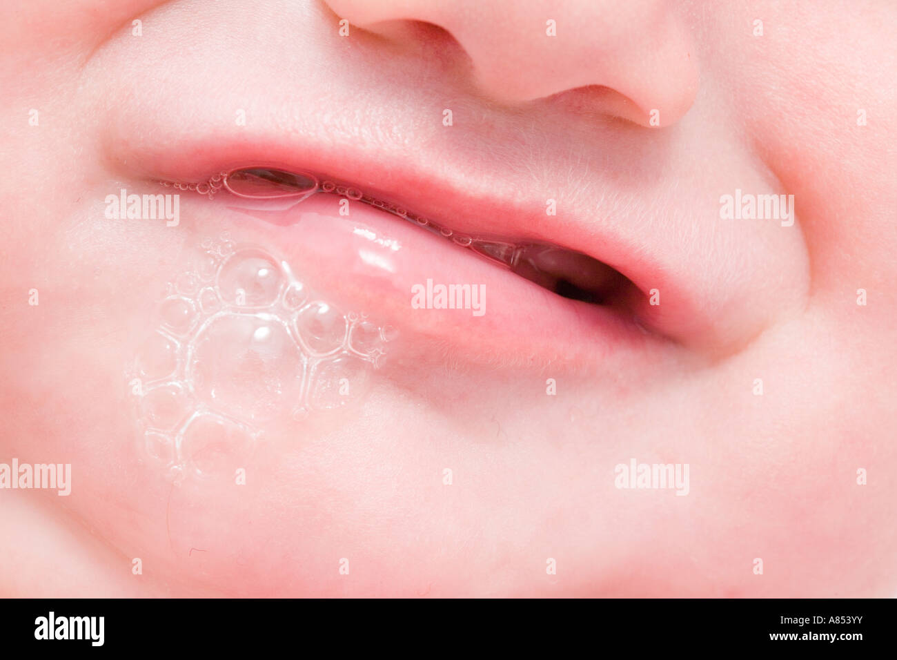 Detail of Baby Mouth Dribbling Because of Teething Stock Photo - Alamy